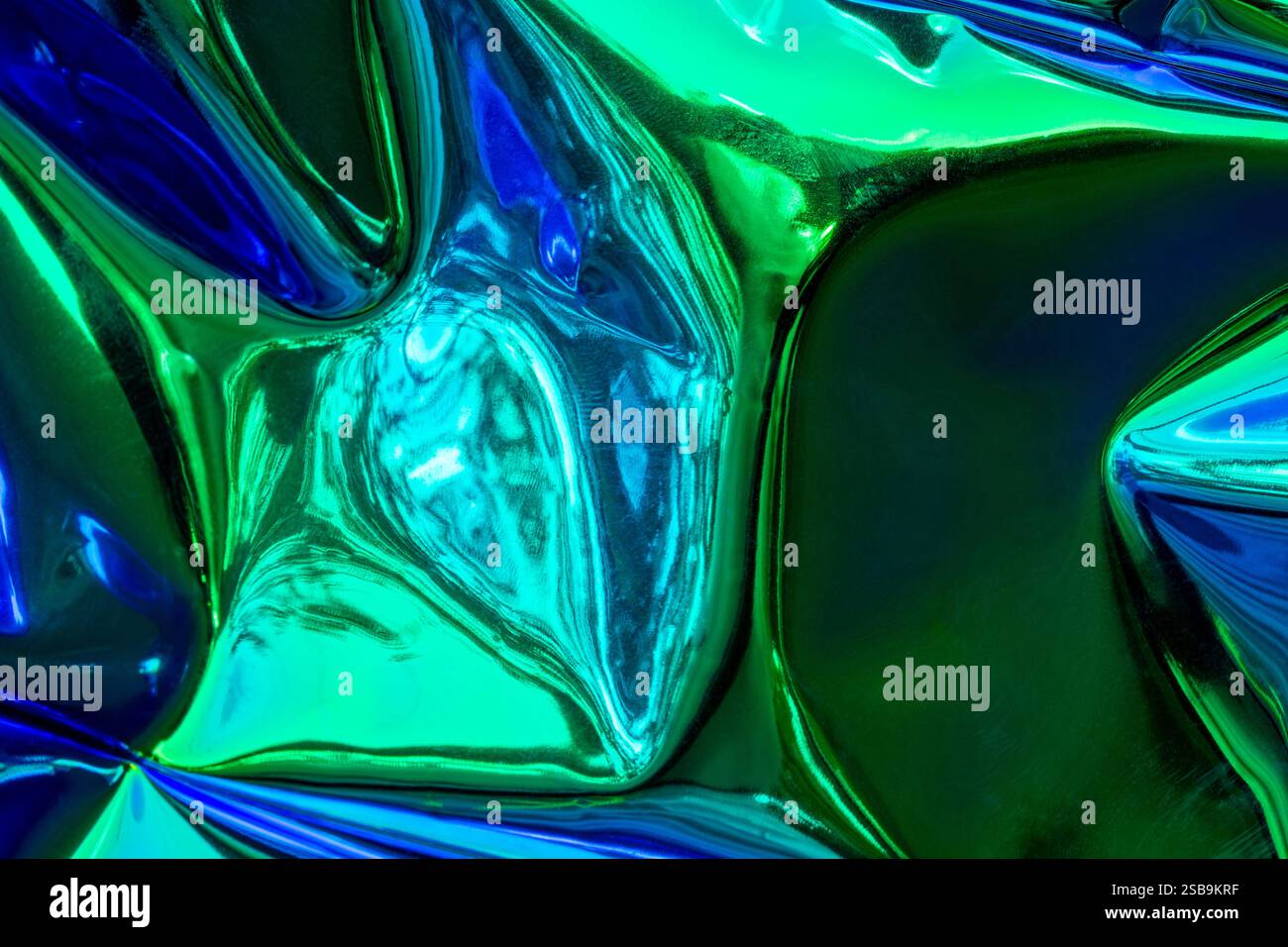 Abstract neon blue green metallic holographic foil texture Stock Photo ...