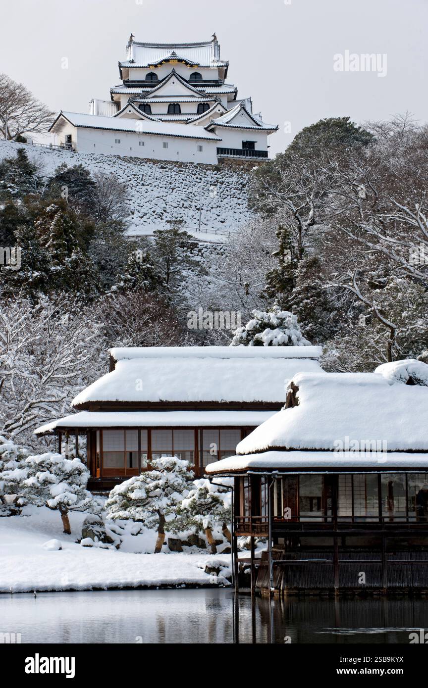 Snowy winter scene at Hikone Castle Genkyuen landscape garden in Hikone ...