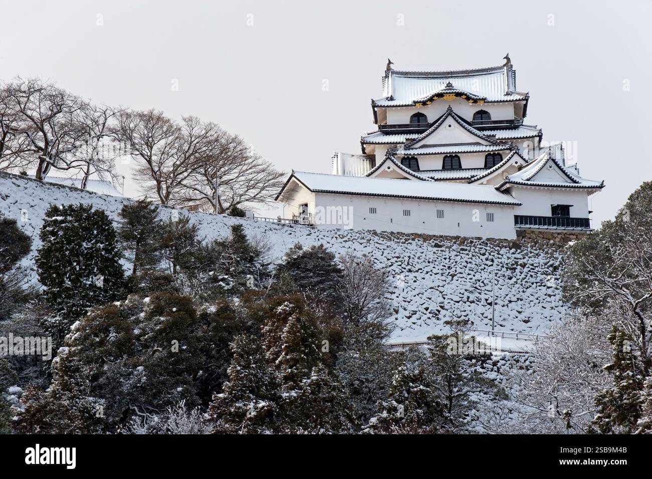 Snowy winter scene at Hikone Castle, one of twelve original feudal ...