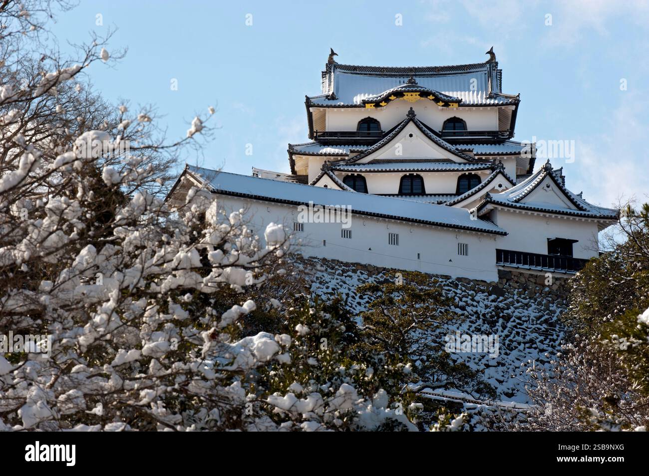 Snowy winter scene at Hikone Castle, one of twelve original feudal ...
