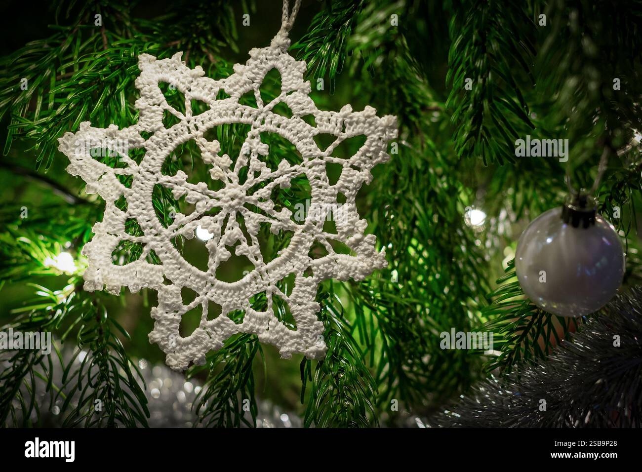 Star shape lights hanging hi-res stock photography and images - Alamy