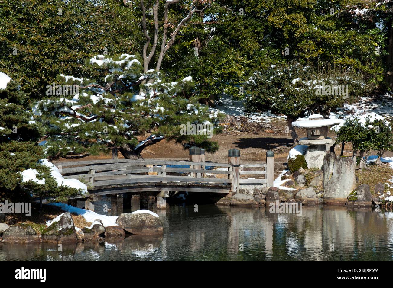 Snowy winter scene at Hikone Castle Genkyuen landscape garden in Hikone ...