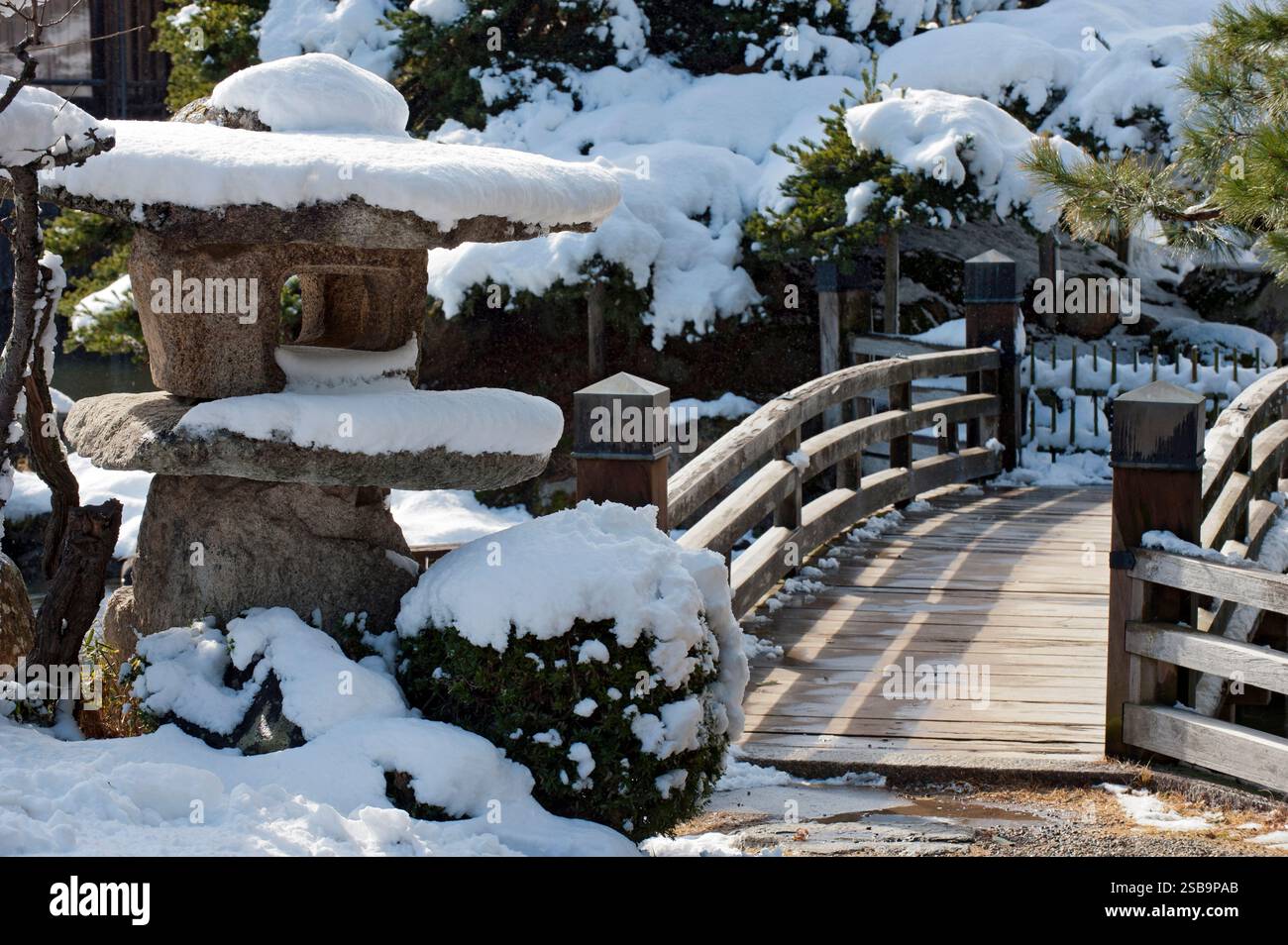 Snowy winter scene at Hikone Castle Genkyuen landscape garden in Hikone ...