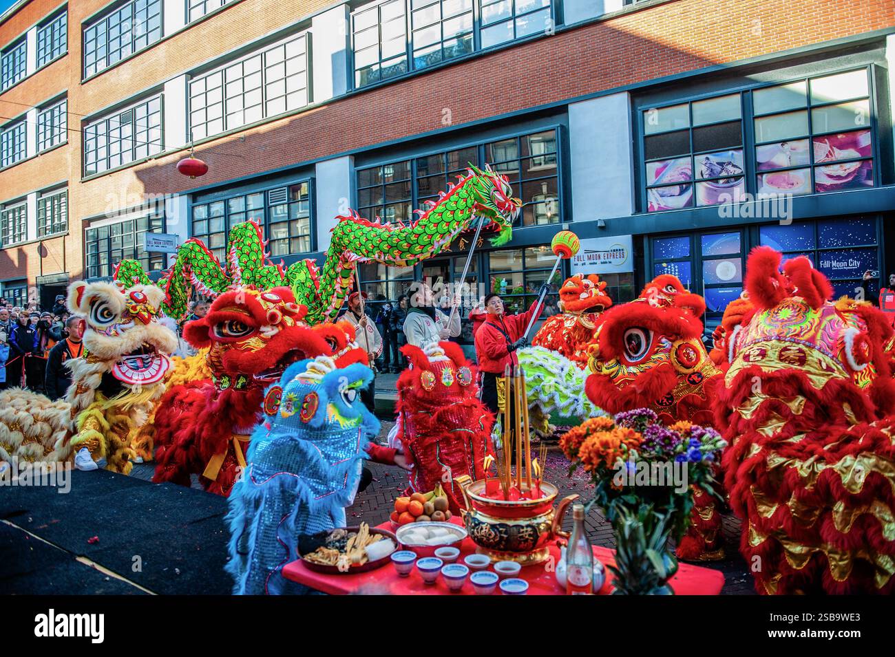 Dancing asian dragons in hi-res stock photography and images - Alamy