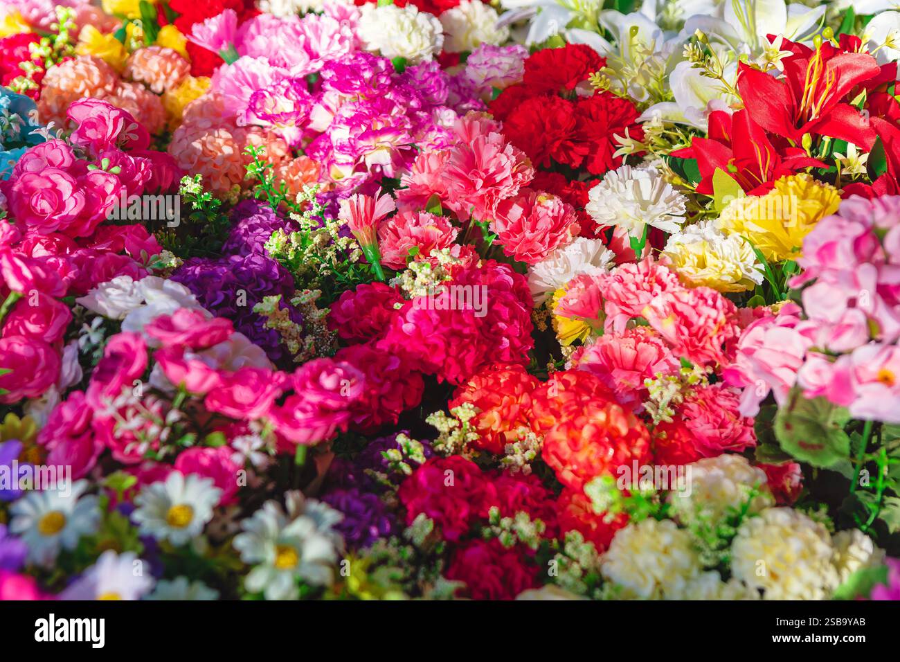 Collection of colorful natural flowers. Flowers are densely packed ...