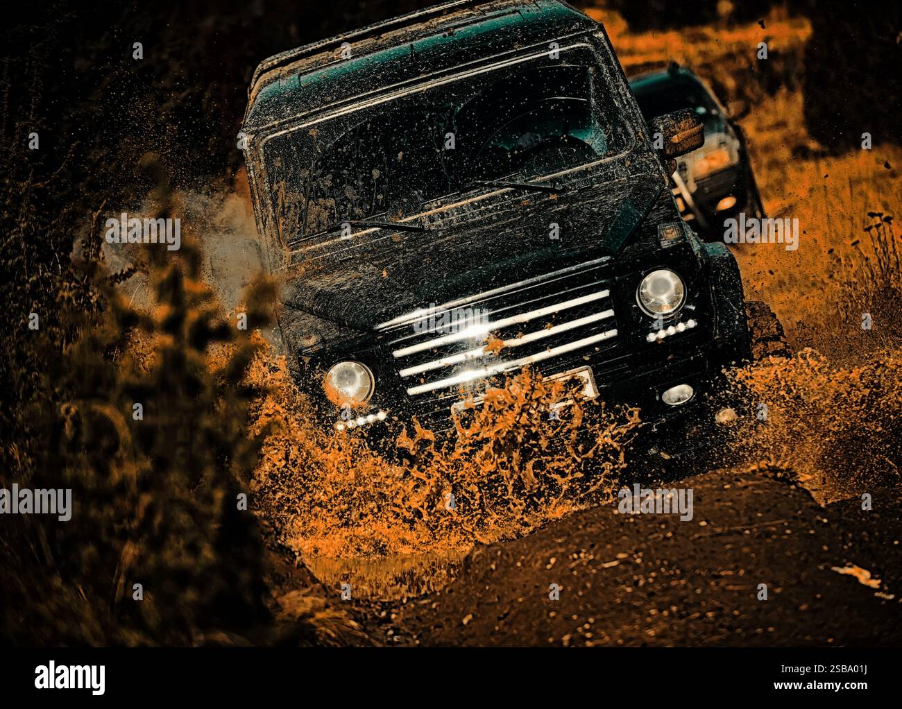 Off the road travel on mountain road. Track on mud. 4x4 Off-road suv ...