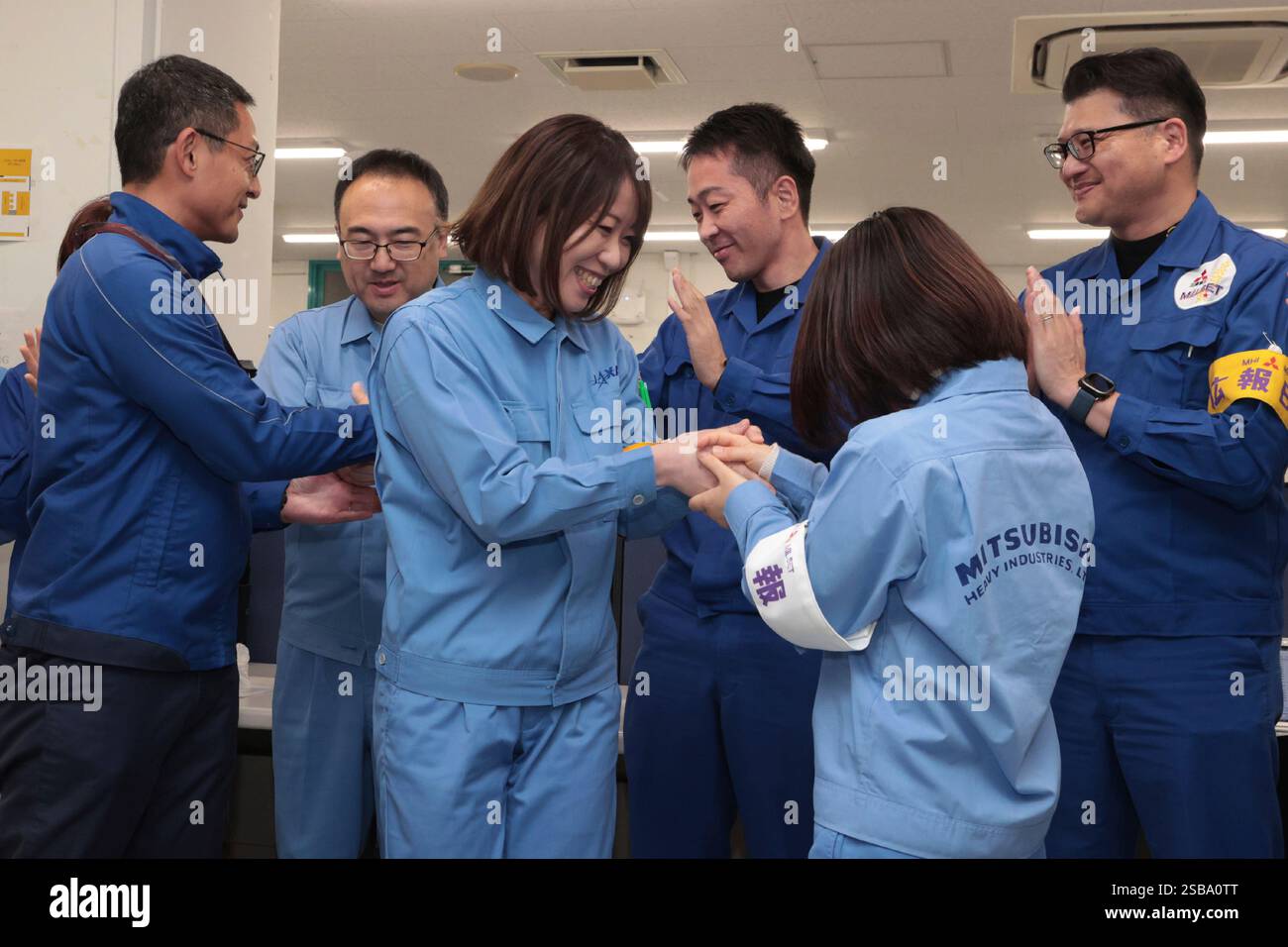 Staffs celebrate after H3 rocket (H3 Launch Vehicle) F5 launching at ...