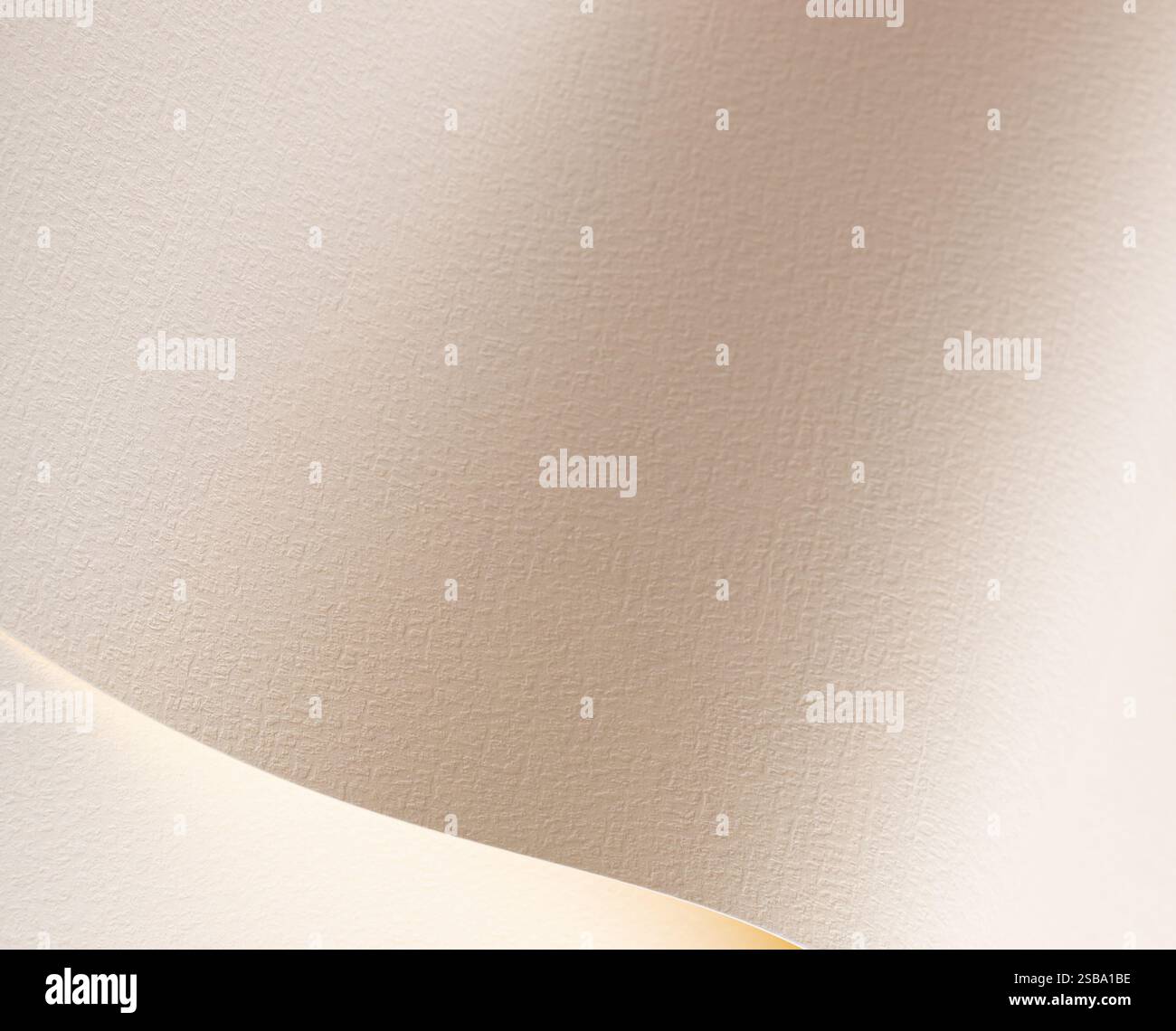 A beige paper background with a textured surface, featuring soft tones ...