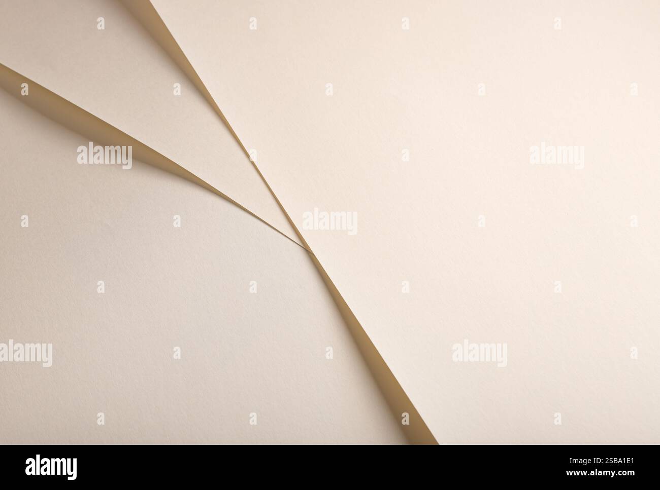 A cream white paper background with a soft, smooth texture and a ...