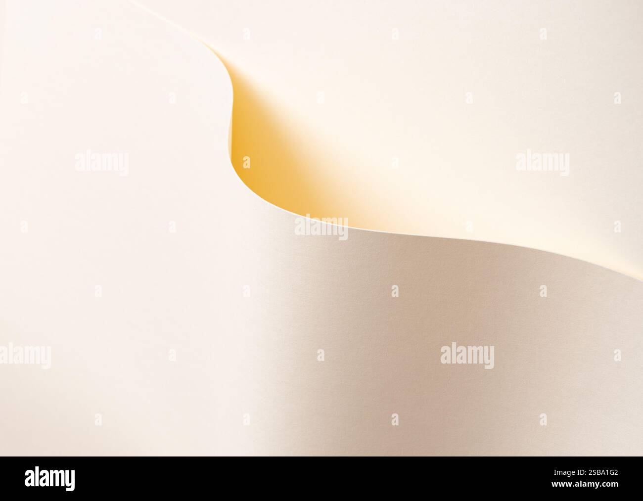 A softly curved beige paper background with a smooth, refined texture ...