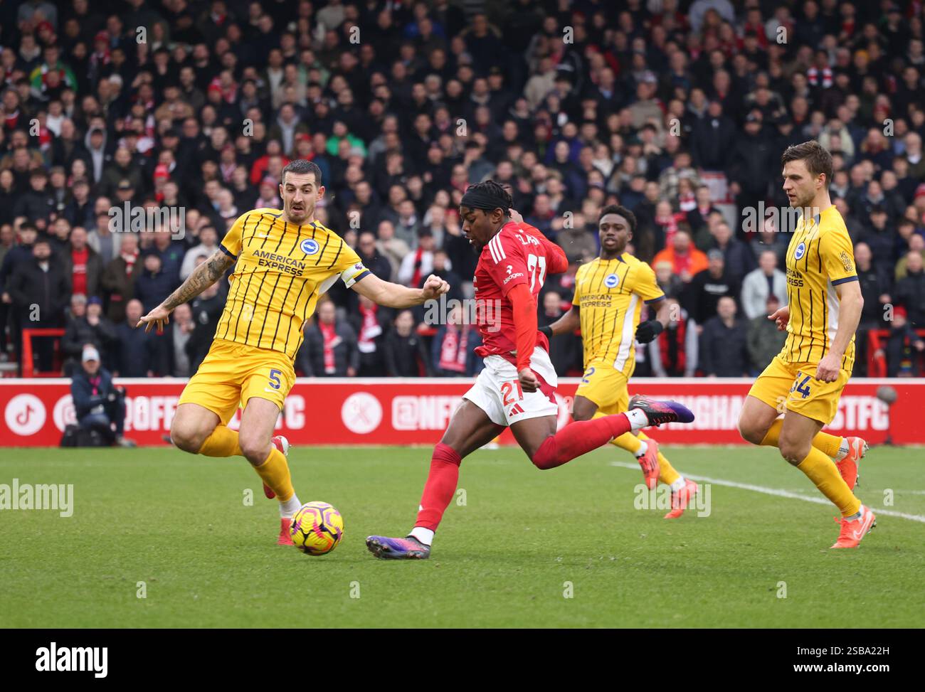 Nottingham, UK. 01st Feb, 2025. Lewis Dunk (B&HA) Anthony Elanga (NF ...