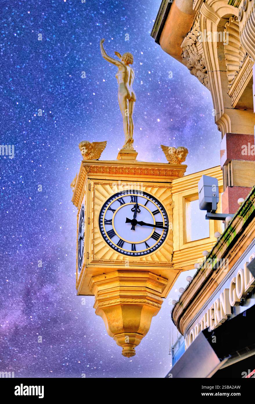 The Northern Goldsmiths golden clock and statue on Blackett St ...