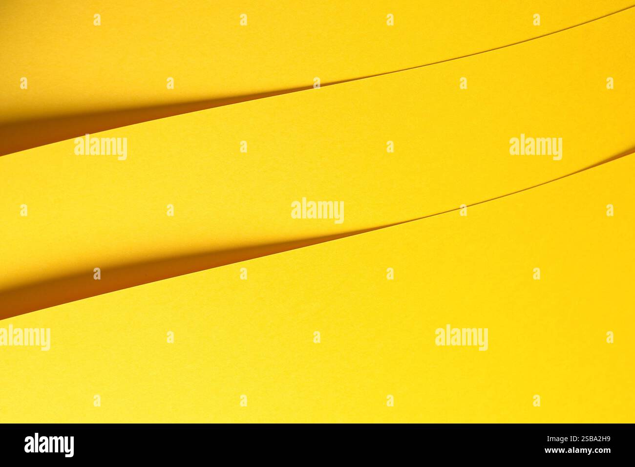 Lemon yellow paper background with a smooth matte surface and radiant ...