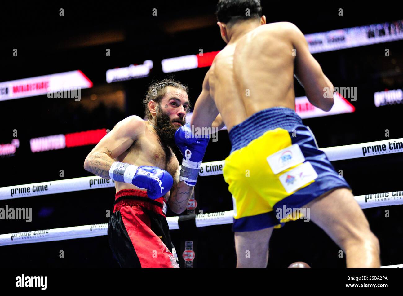 Newark, USA. 01st Feb, 2025. Angelo Ramos (red and black) fell to Keith ...