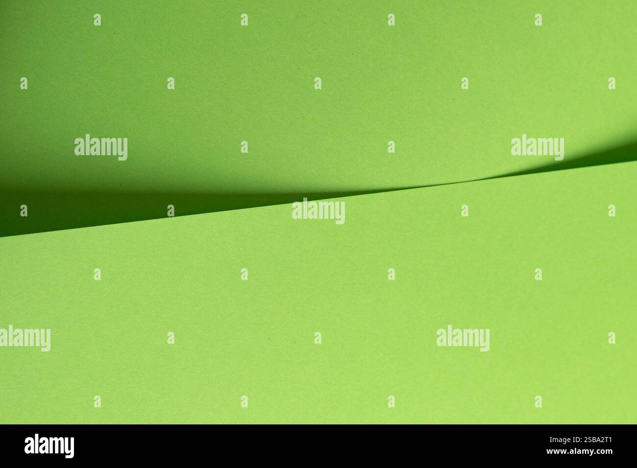 Lime green paper background with a smooth matte surface and vibrant ...