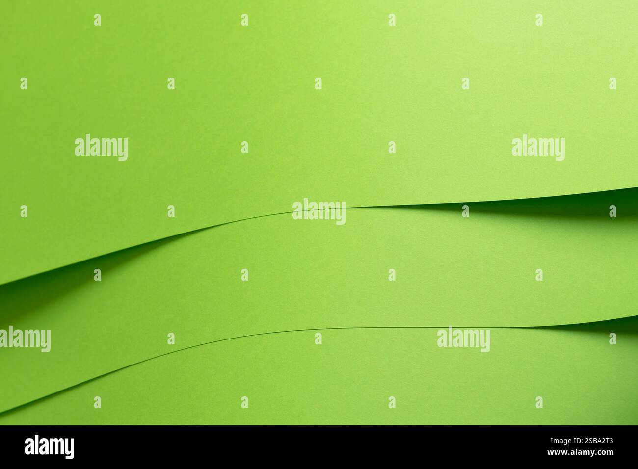 Lime green paper background with a smooth matte surface and a subtle ...