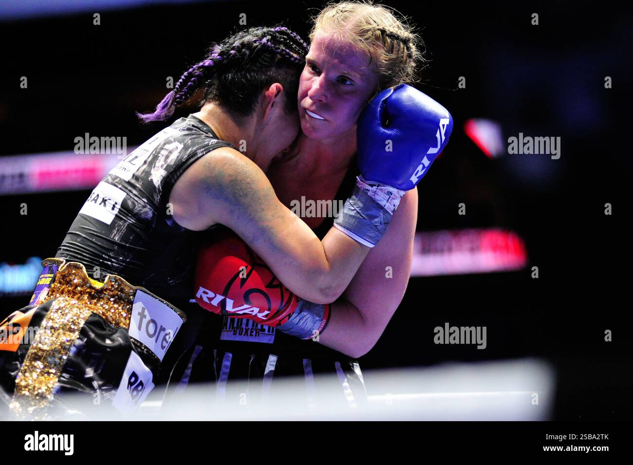 Beata Dudek (black and white) fell to Miyo Yoshida (black and gold) in ...