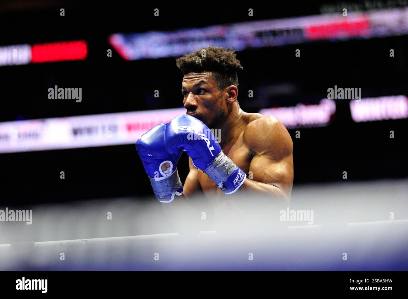 Rommell Toran (blue and gold shorts) fell to John Vallejo by way of ...