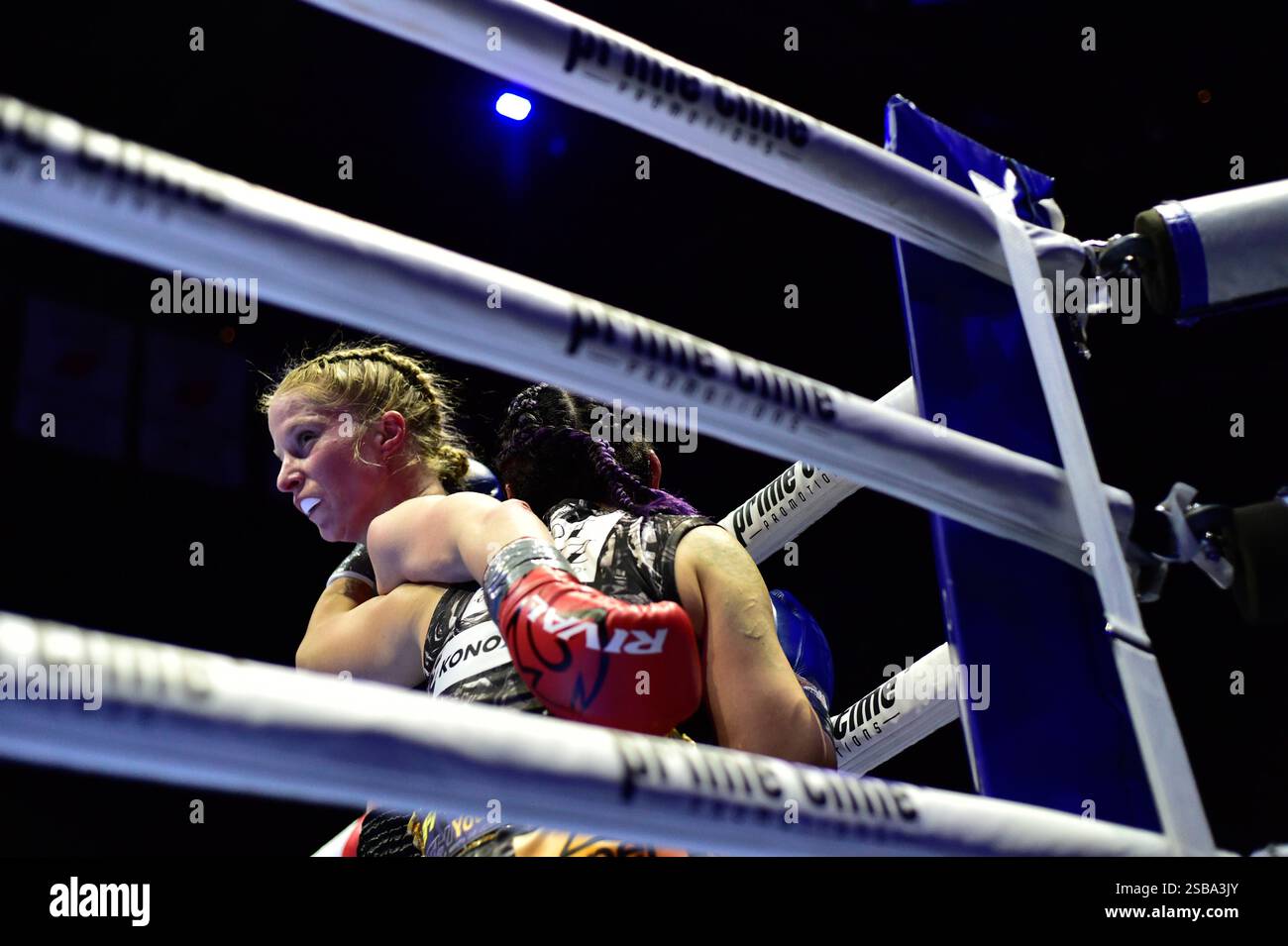 Beata Dudek (black and white) fell to Miyo Yoshida (black and gold) in ...