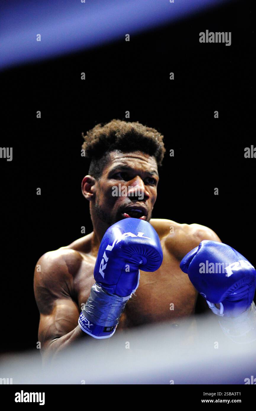 Newark, USA. 01st Feb, 2025. Rommell Toran (blue and gold shorts) fell to John Vallejo by way of ...