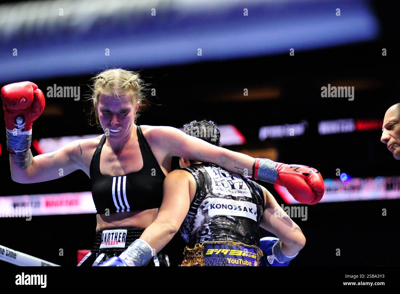 Beata Dudek (black and white) fell to Miyo Yoshida (black and gold) in ...