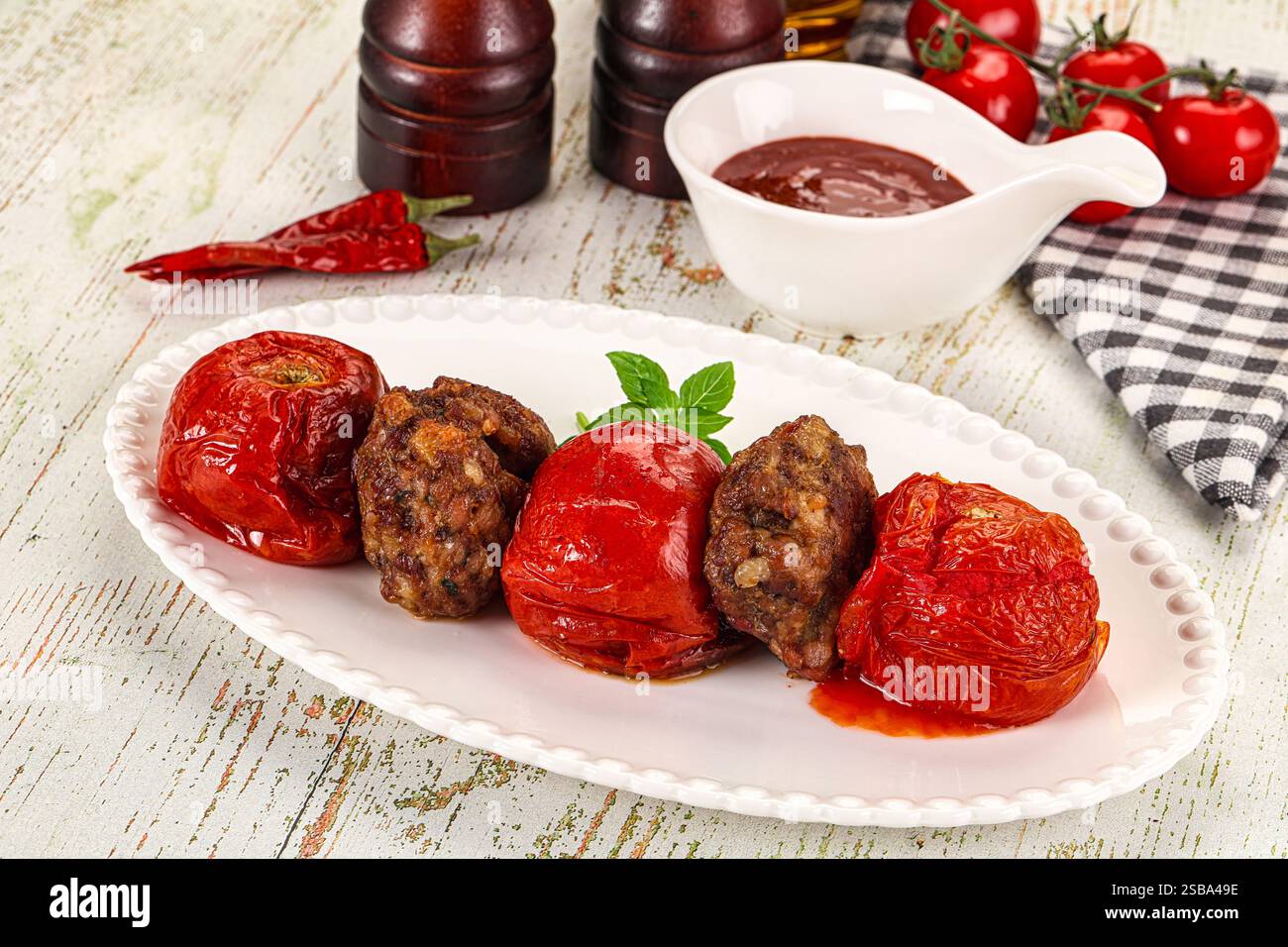 Turkish cuisine - Domatesli Kebab with minced meat and tomato Stock ...