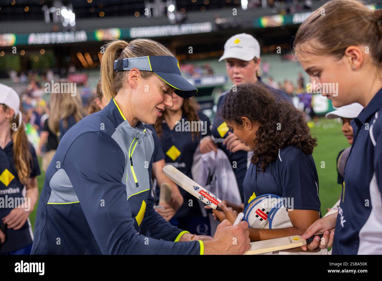 MELBOURNE, AUSTRALIA - FEBRUARY 01: Ellyse Perry of Australia signing ...