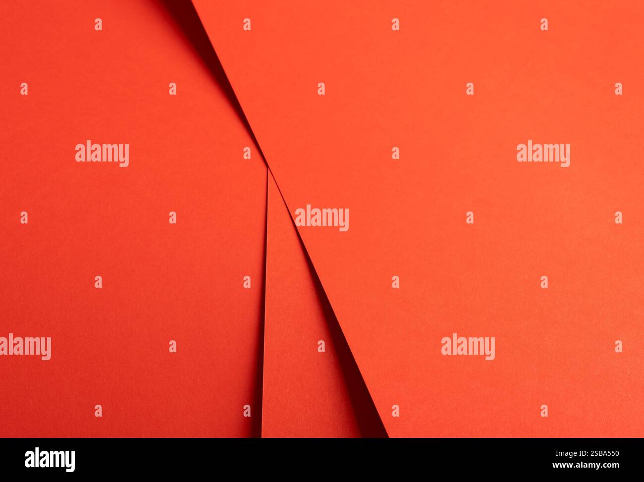 Red and orange paper background with a matte finish and sharp, layered ...