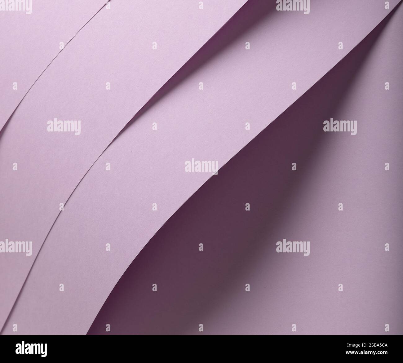 Soft pastel pink and purple paper background with a fine matte texture ...