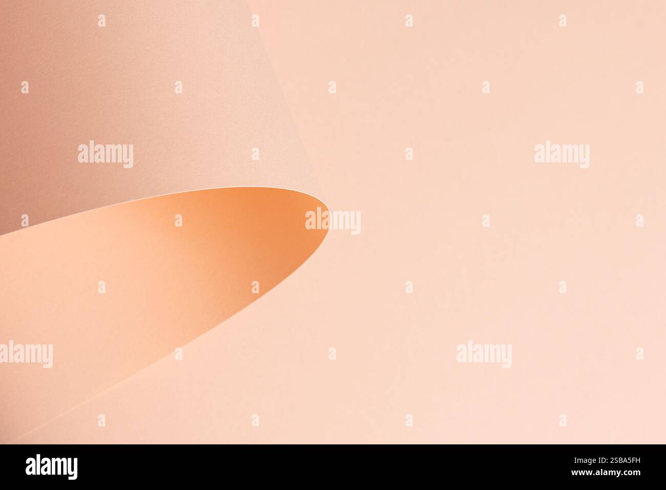 Soft pink and peach paper background with a refined texture and a ...