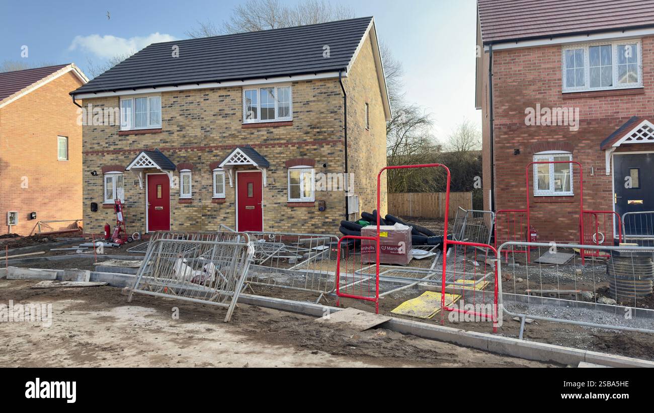 Newly constructed brick houses under development, showing unfinished ...