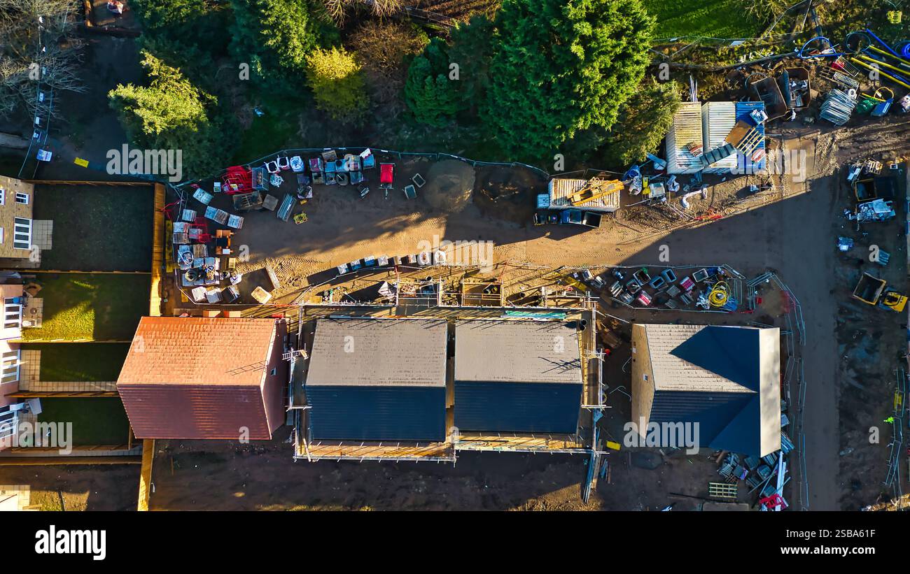 Aerial view of a residential construction site. Two new houses under ...