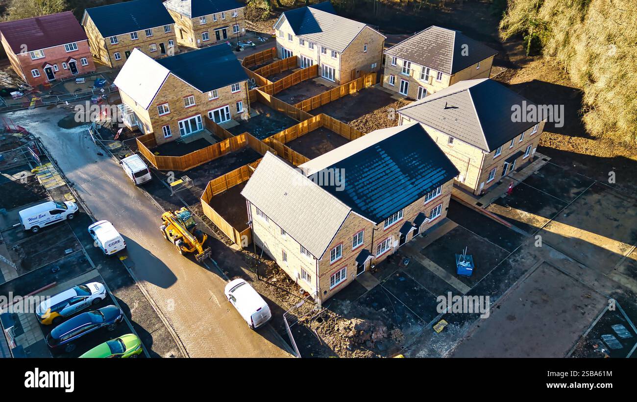 Aerial view of a new housing development under construction. Several ...