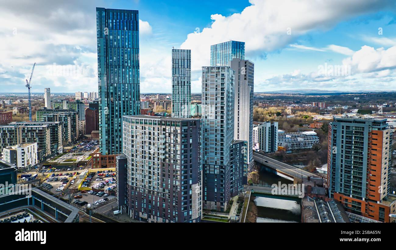 Aerial view of modern high-rise buildings in a city, with a river and ...