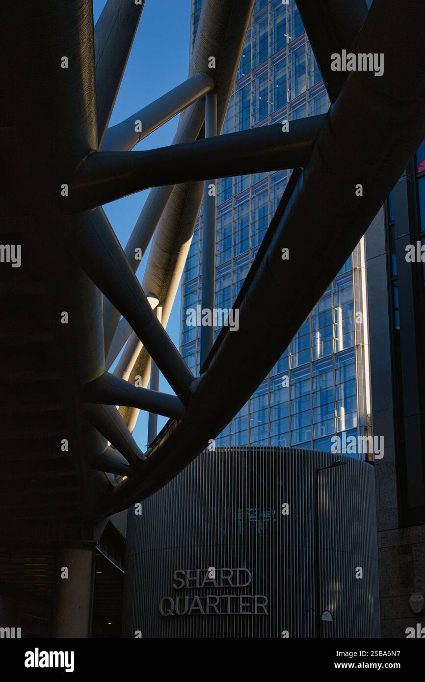 A modern building, Shard Quarter, is partially visible through a ...