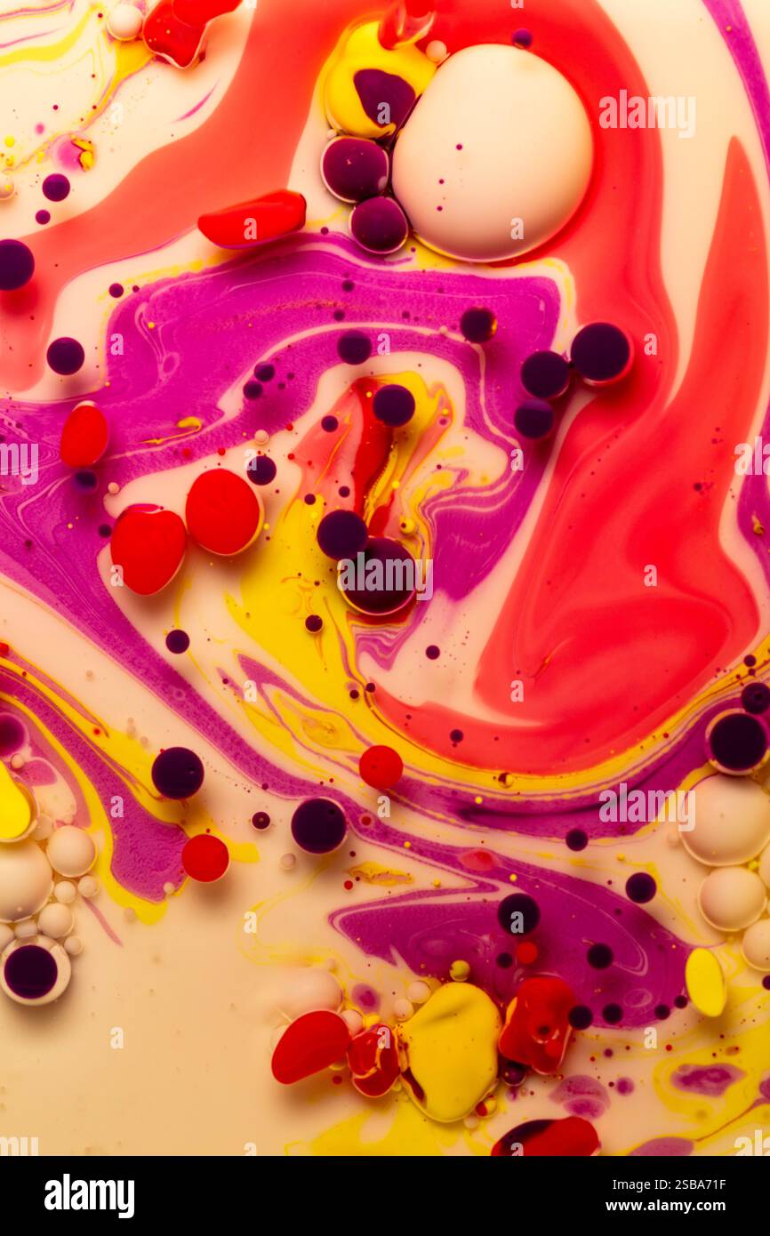 Stunning creative macro abstract still-life of colour infused milk and ...