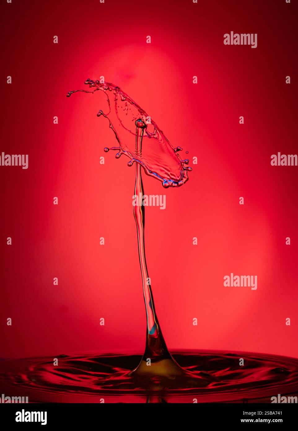 Arresting, ethereal, colour infused, imaginative water collision, macro ...