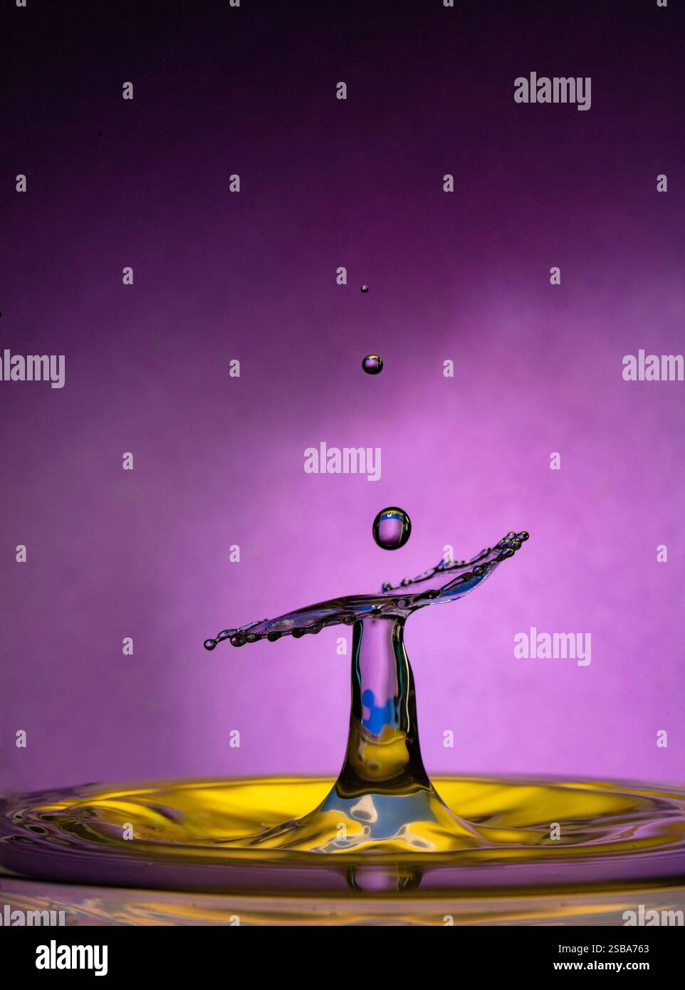 Arresting, ethereal, colour infused, imaginative water collision, macro ...