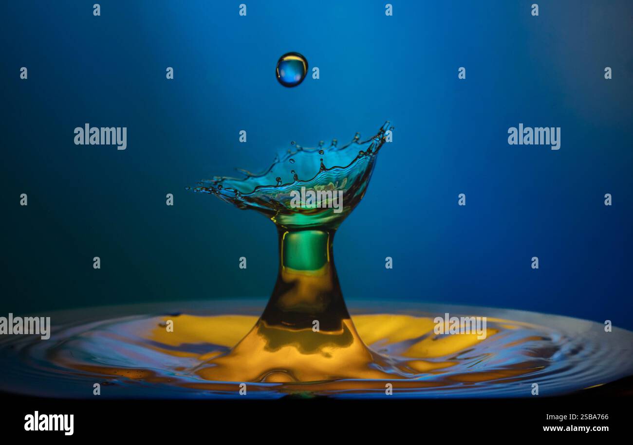 Arresting, ethereal, colour infused, imaginative water collision, macro ...