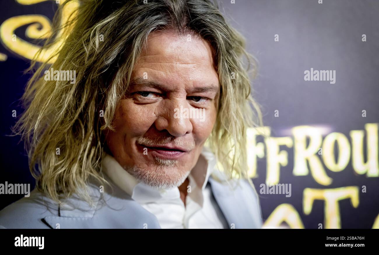 AMSTERDAM - Tygo Gernandt on the red carpet prior to the premiere of ...