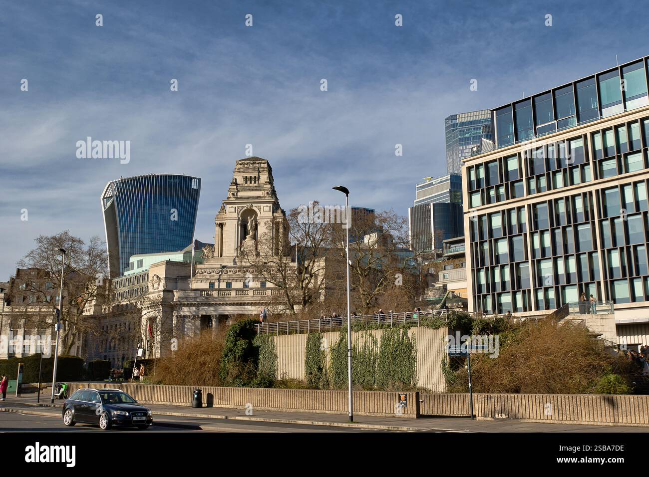 A cityscape featuring a mix of modern and classical architecture under ...