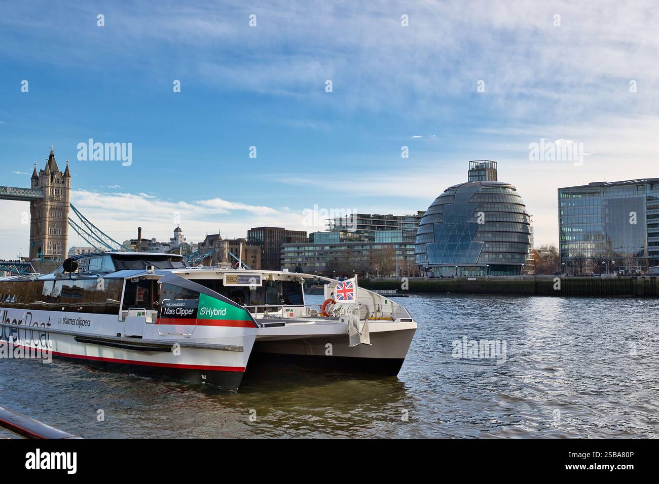 A hybrid catamaran, the Mars Clipper, on the Thames River in London ...