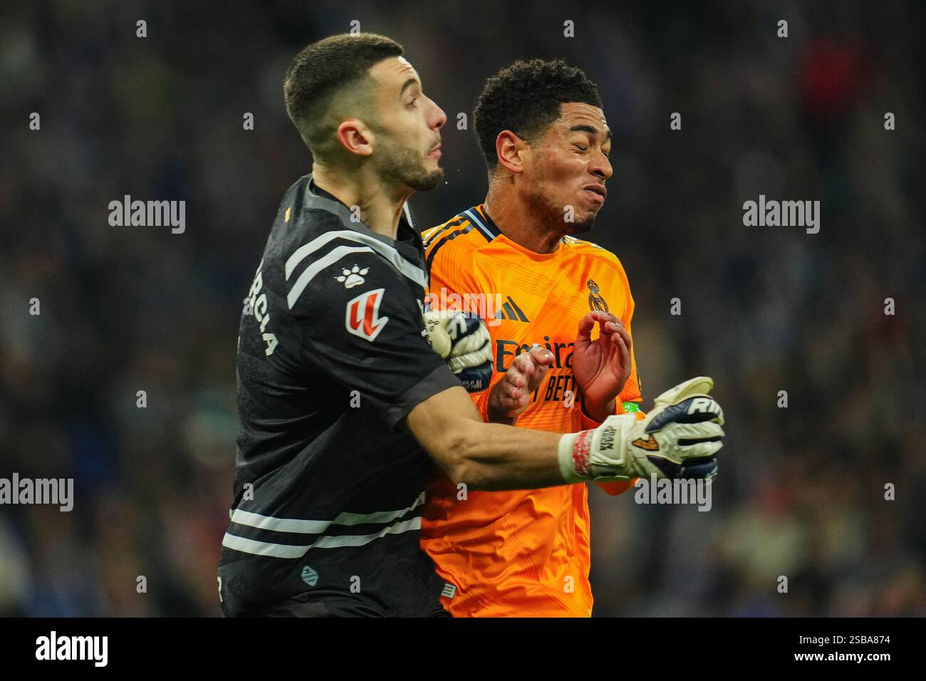 Jude Bellingham of Real Madrid and Joan Garcia of RCD Espanyol during ...