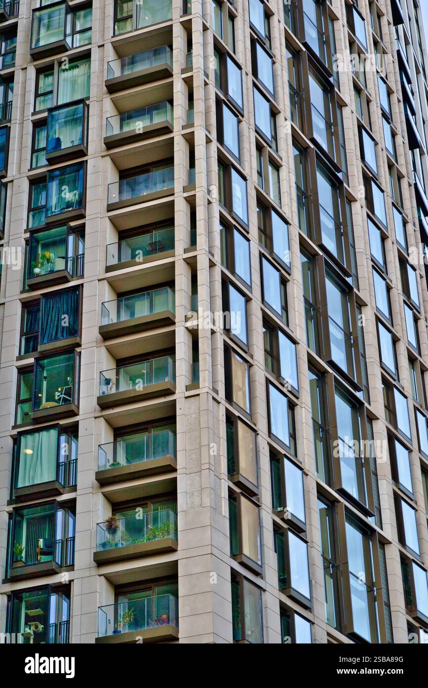 A high-rise residential building's exterior, showcasing numerous ...