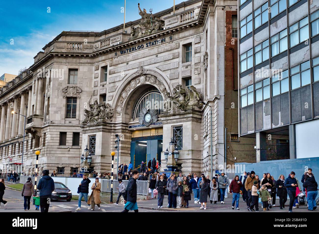 Waterloo Station's main entrance, a grand stone building with classical ...