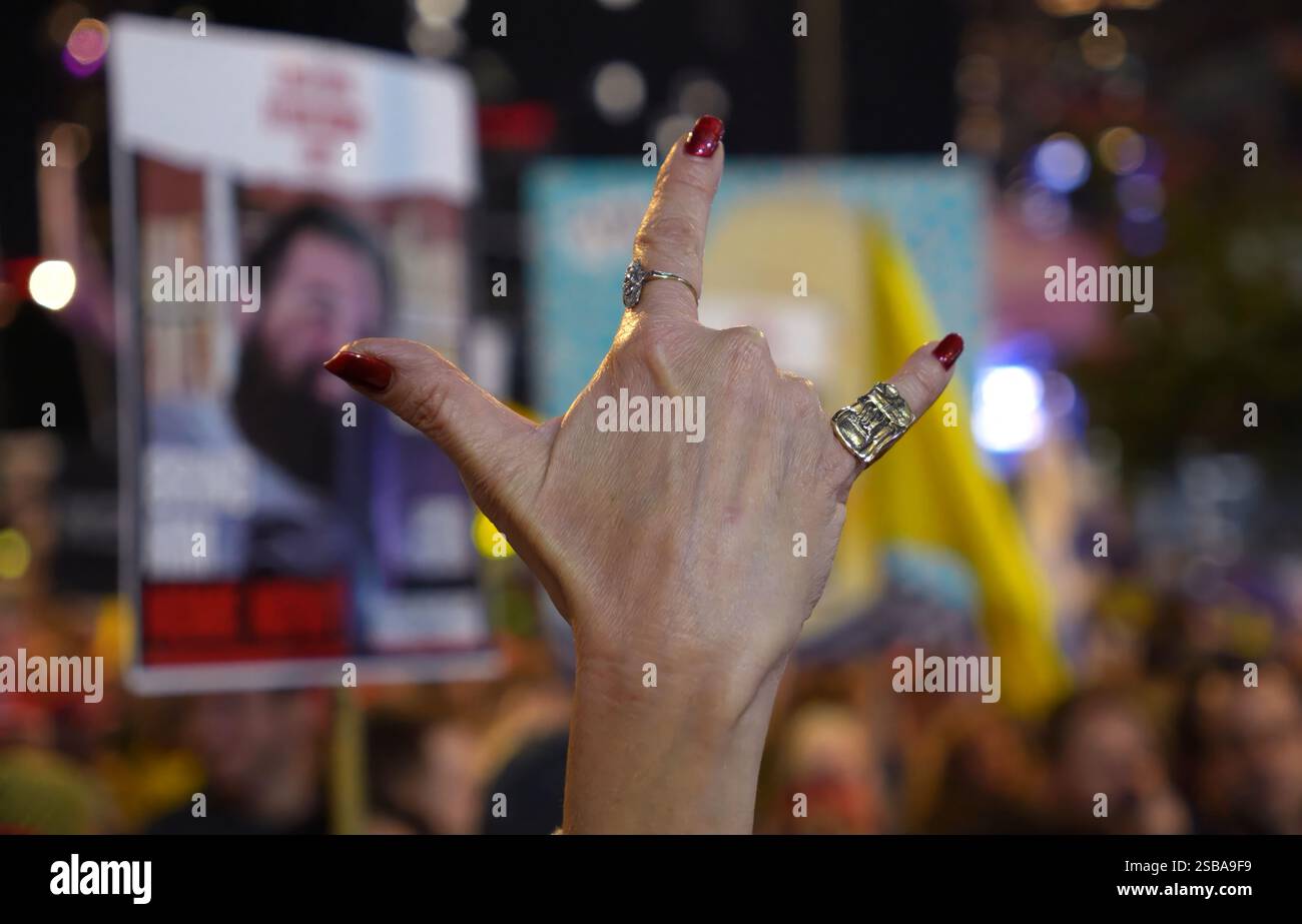 TEL AVIV, ISRAEL - FEBRUARY 1: An Israeli woman holds her index and ...