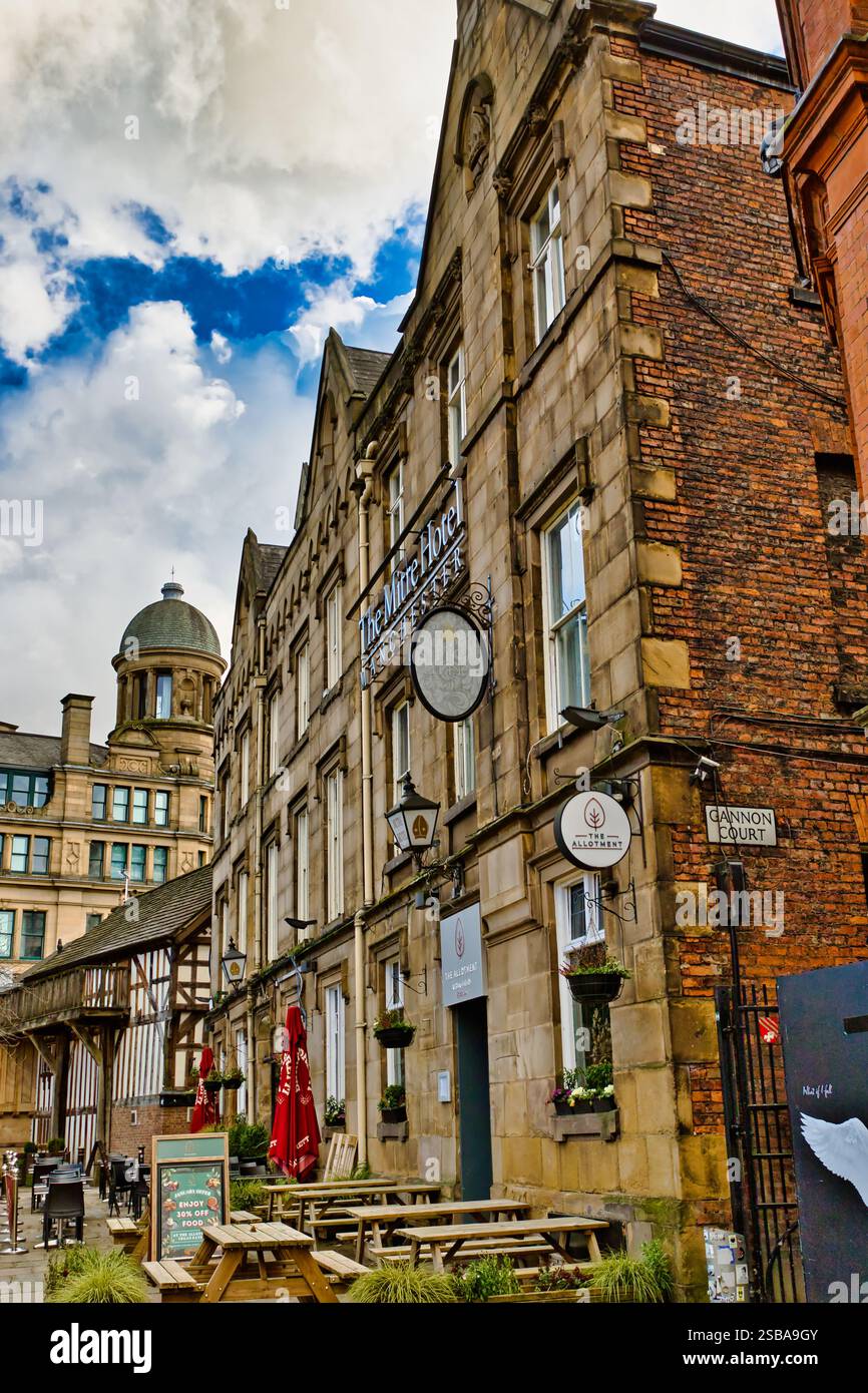 A multi-story stone building, "The Allotment" hotel in Manchester, with ...