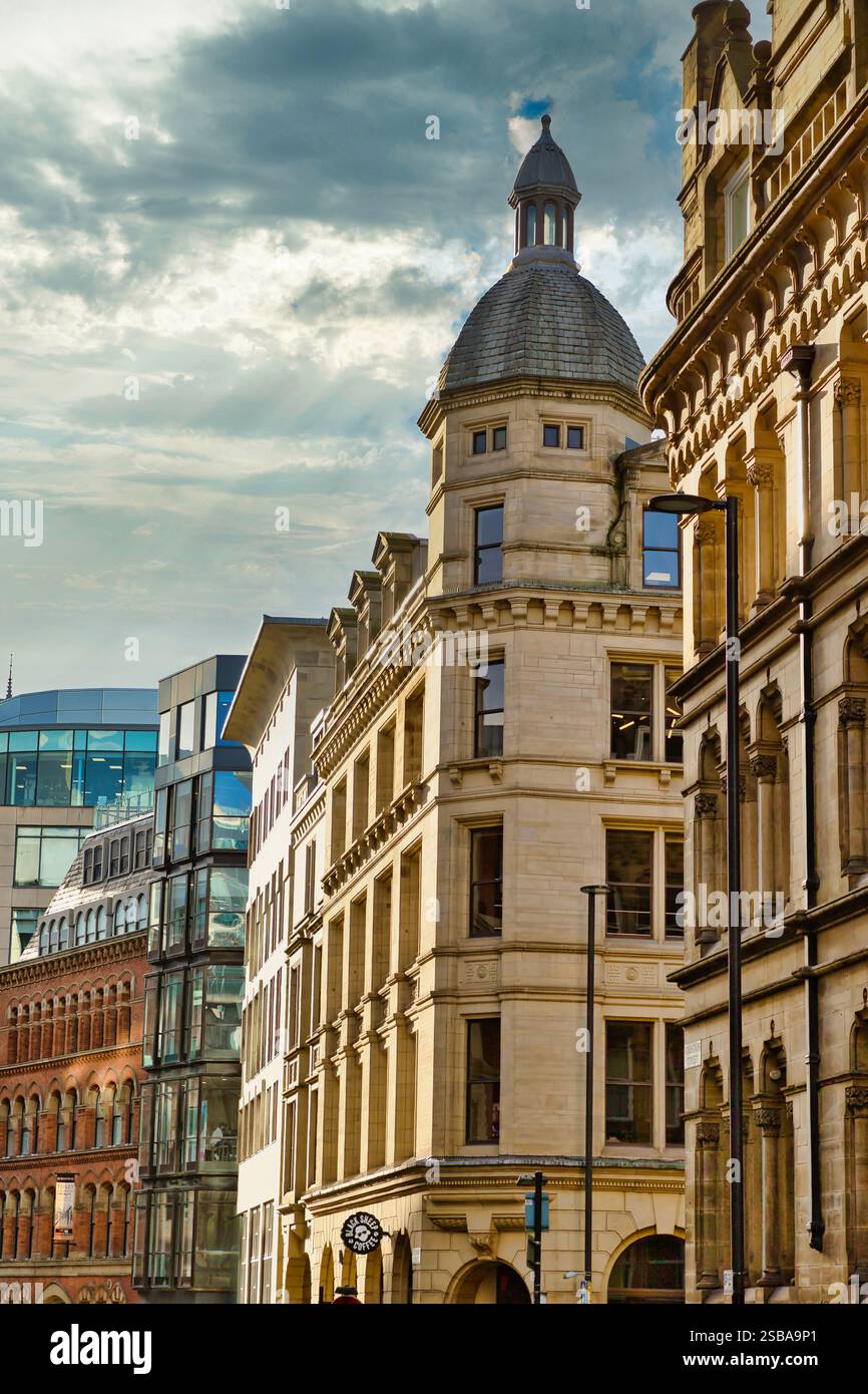 A city streetscape featuring several multi-story buildings of varying ...