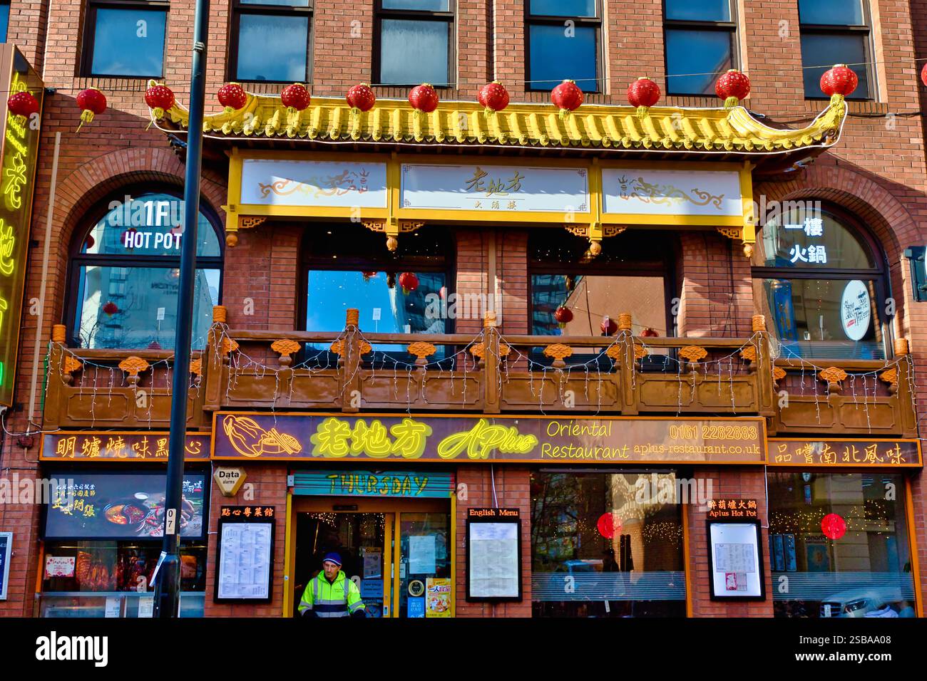 Aplus Oriental Restaurant storefront in a brick building with Chinese ...