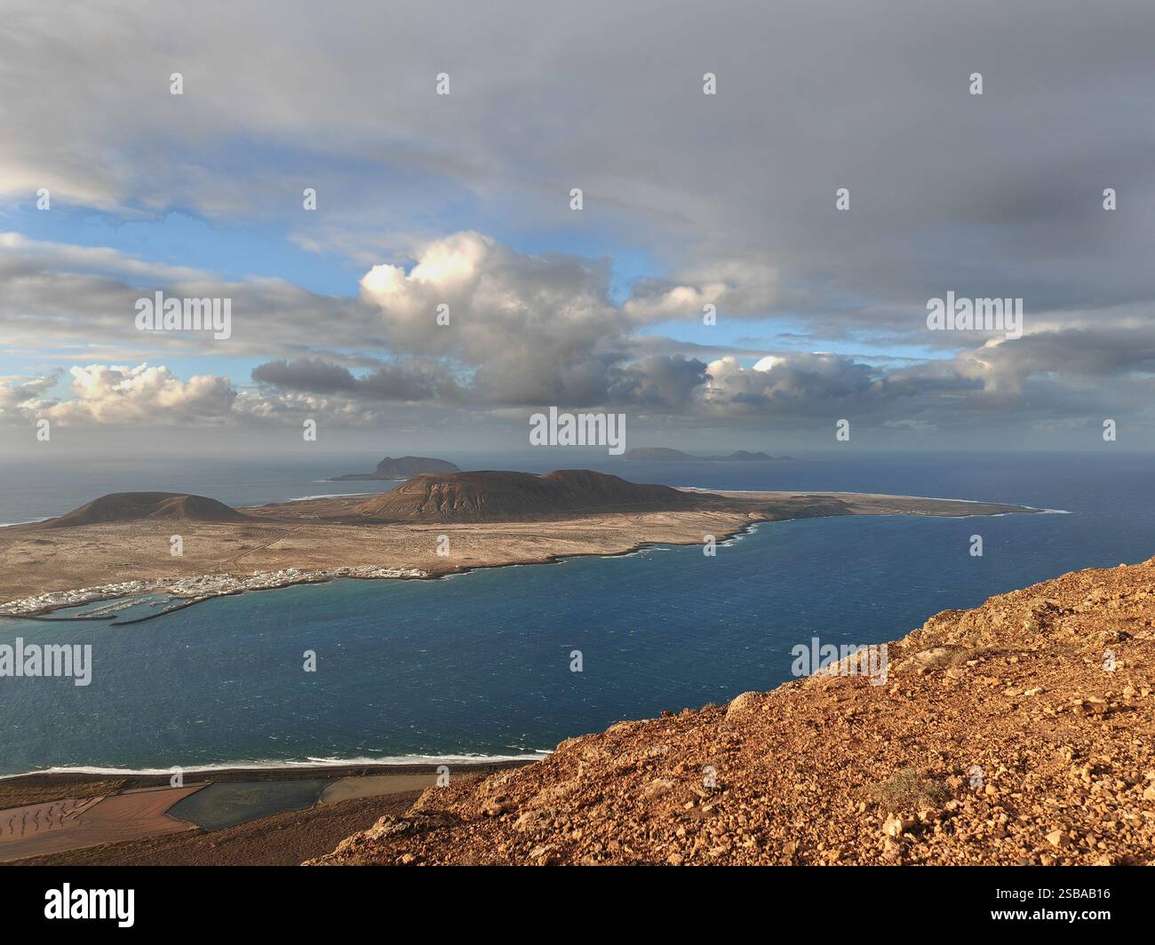 Sunset from a panoramic viewpoint Mirador del Rio above the island of ...